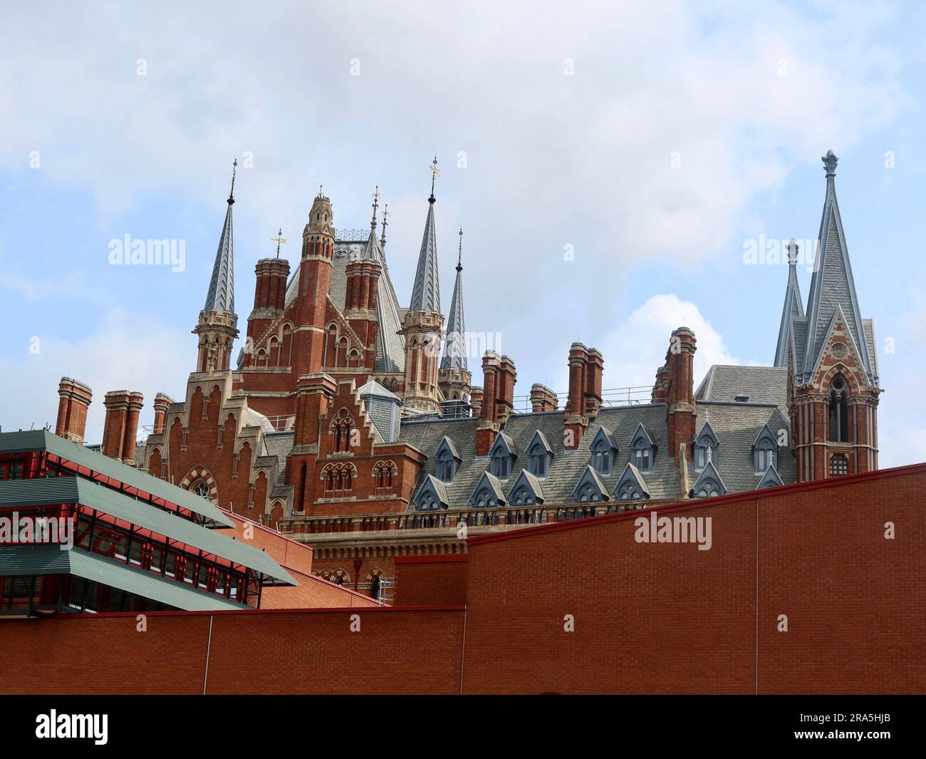 London, UK - June 2023 : Contrasting architecture. The rooftops of the ...