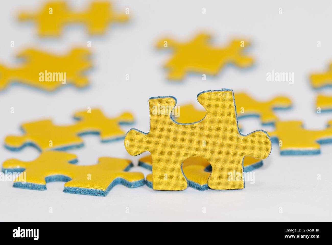 Yellow puzzle hi-res stock photography and images - Alamy