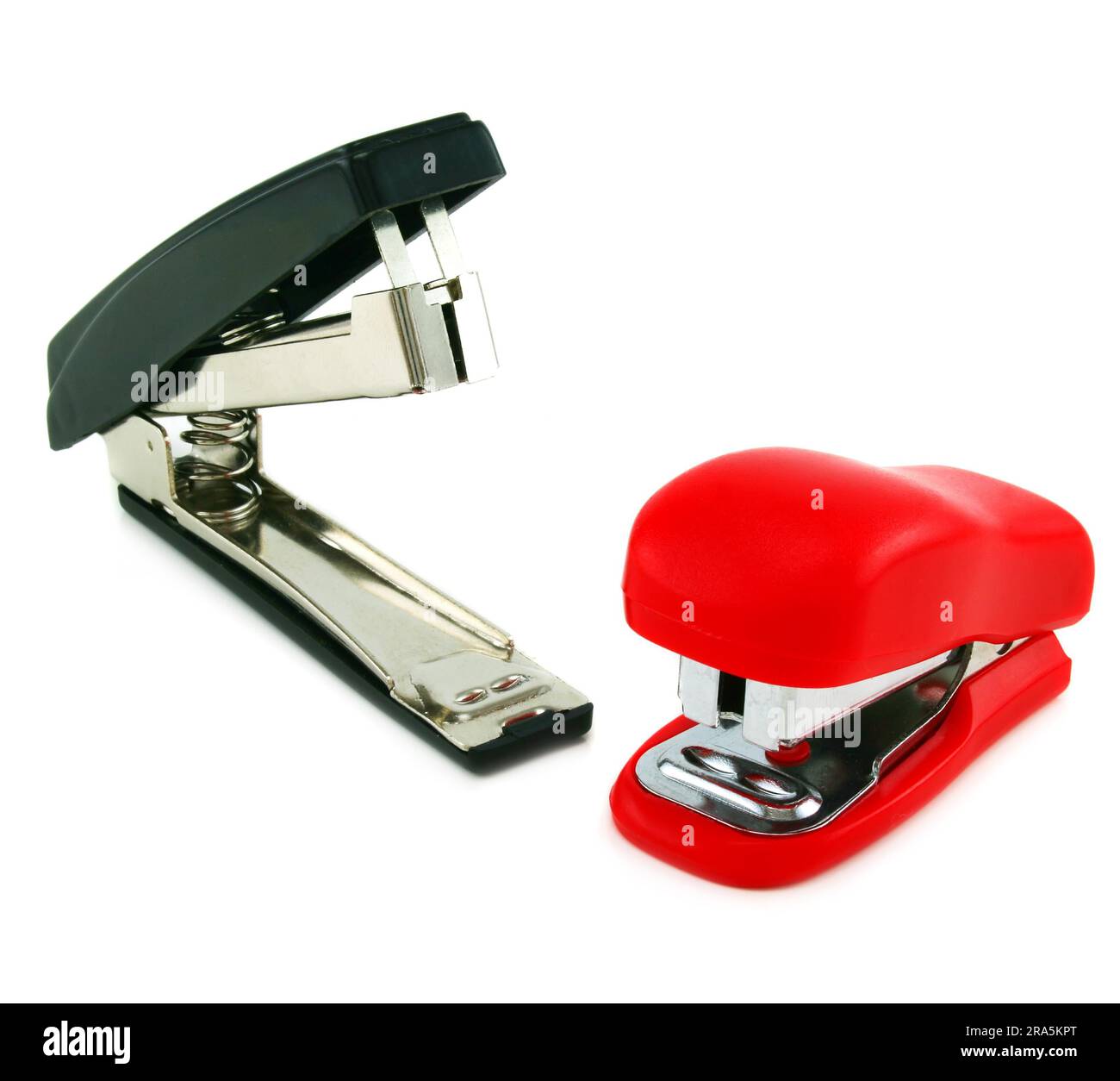 Two staplers isolated on a white background Stock Photo - Alamy