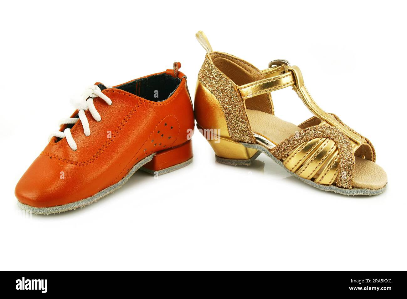 Pair of tiny dancing shoes (men's and woman's) isolated on a white ...