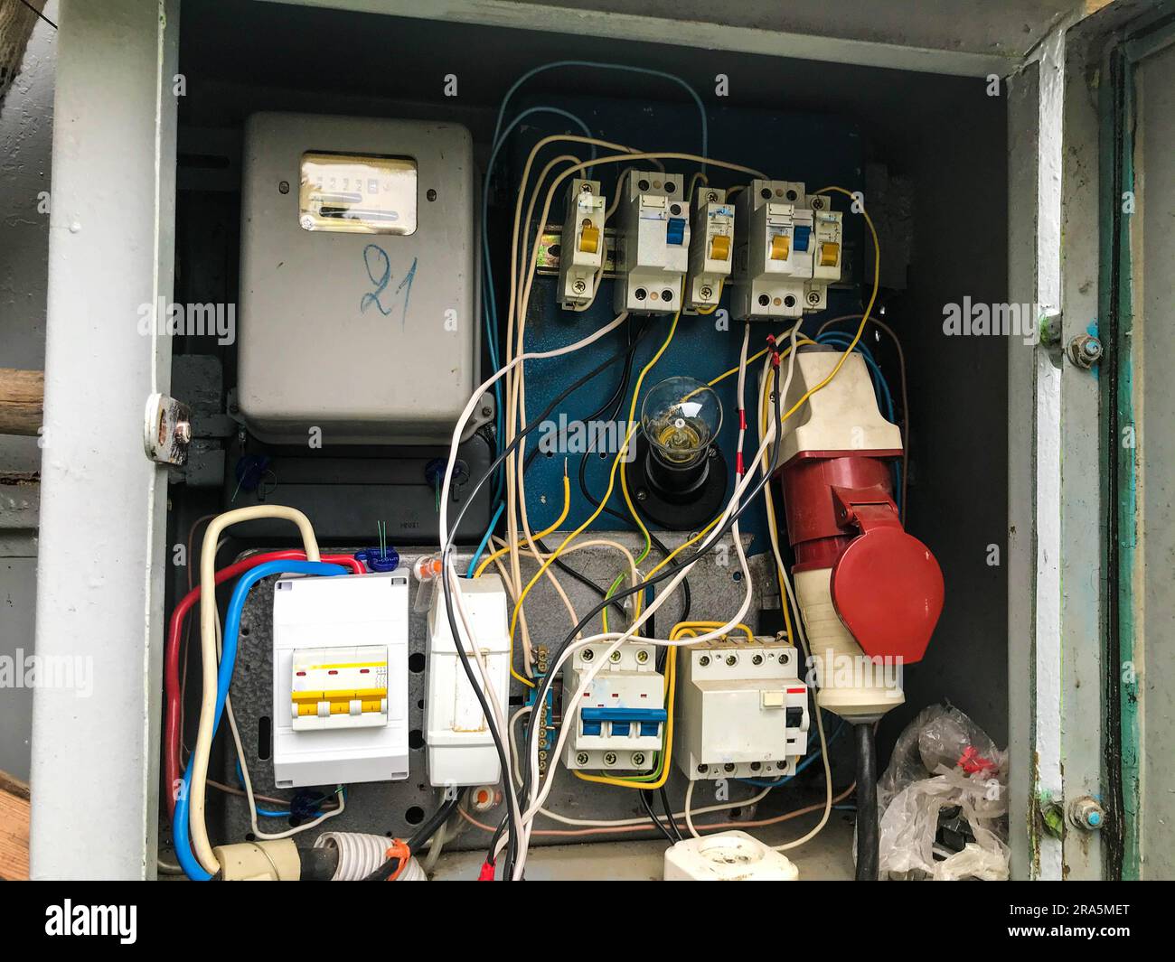 homemade electrical panel. wires and special meters in white. switches ...