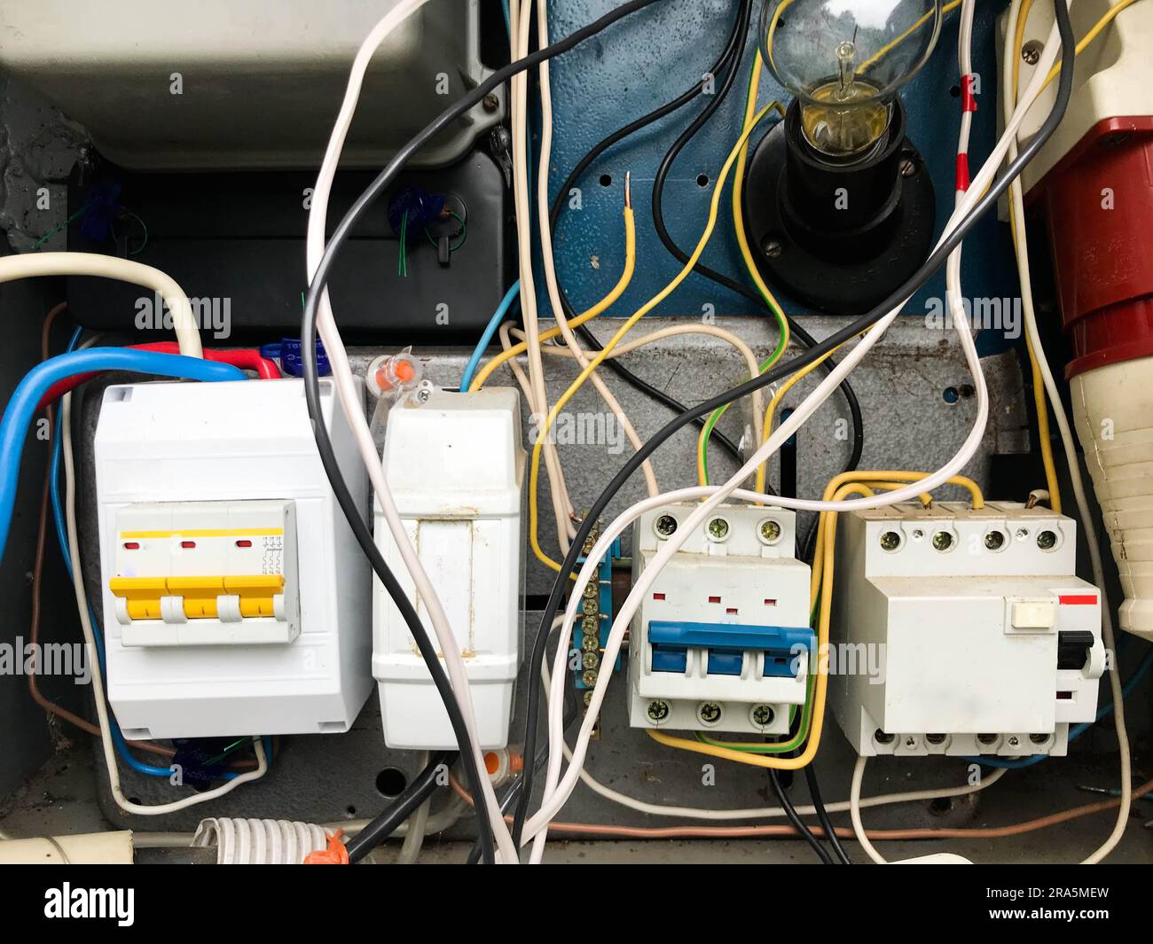 homemade electrical panel. wires and special meters in white. switches ...