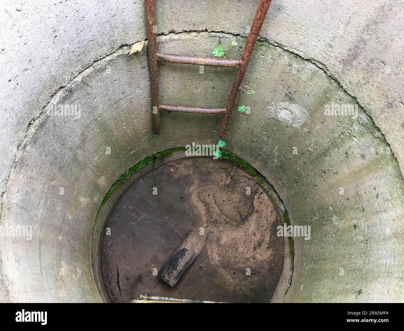 homemade well. concrete rings are installed in the courtyard of the ...