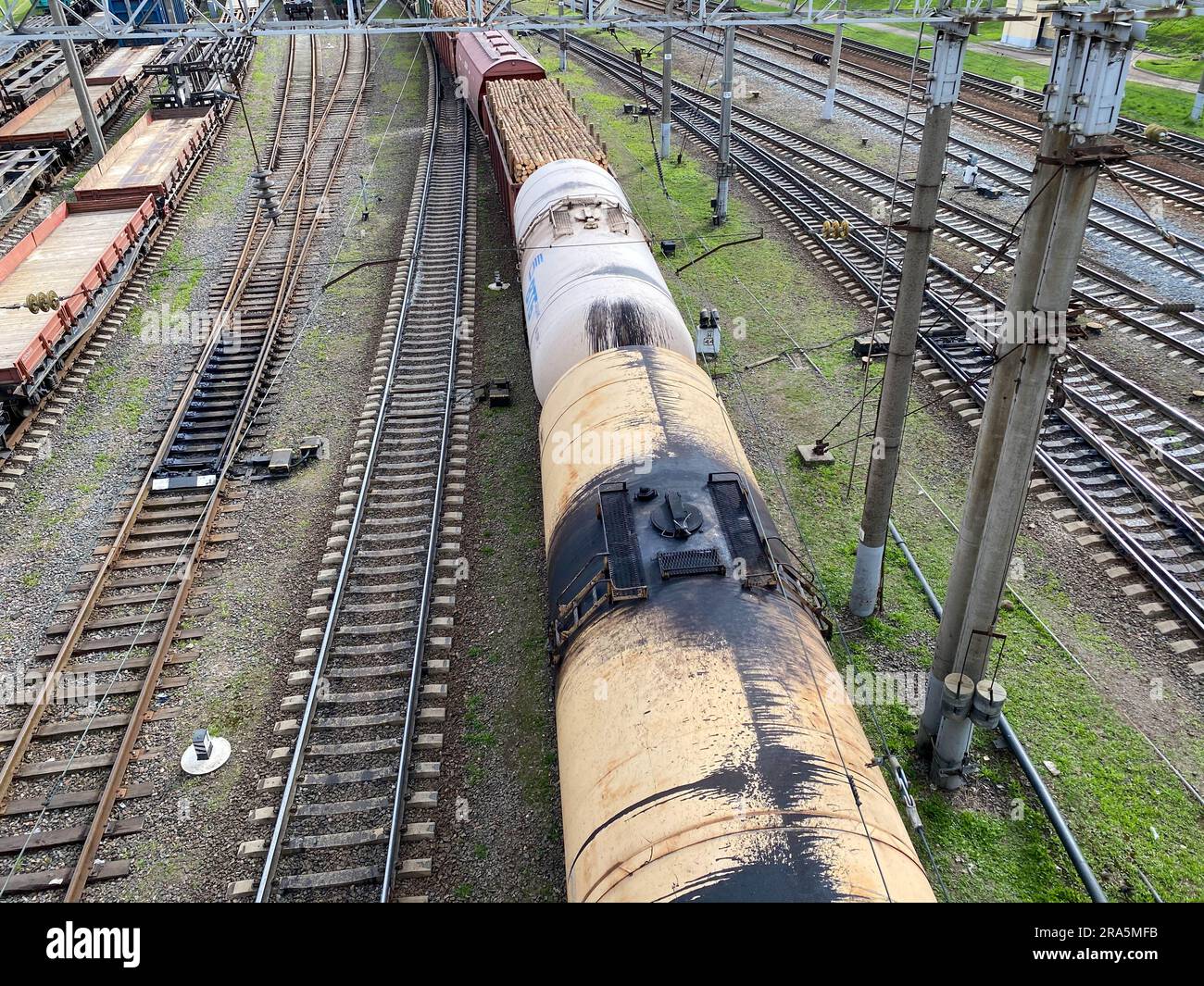 Top view of different railway wagons and tanks on an industrial ...