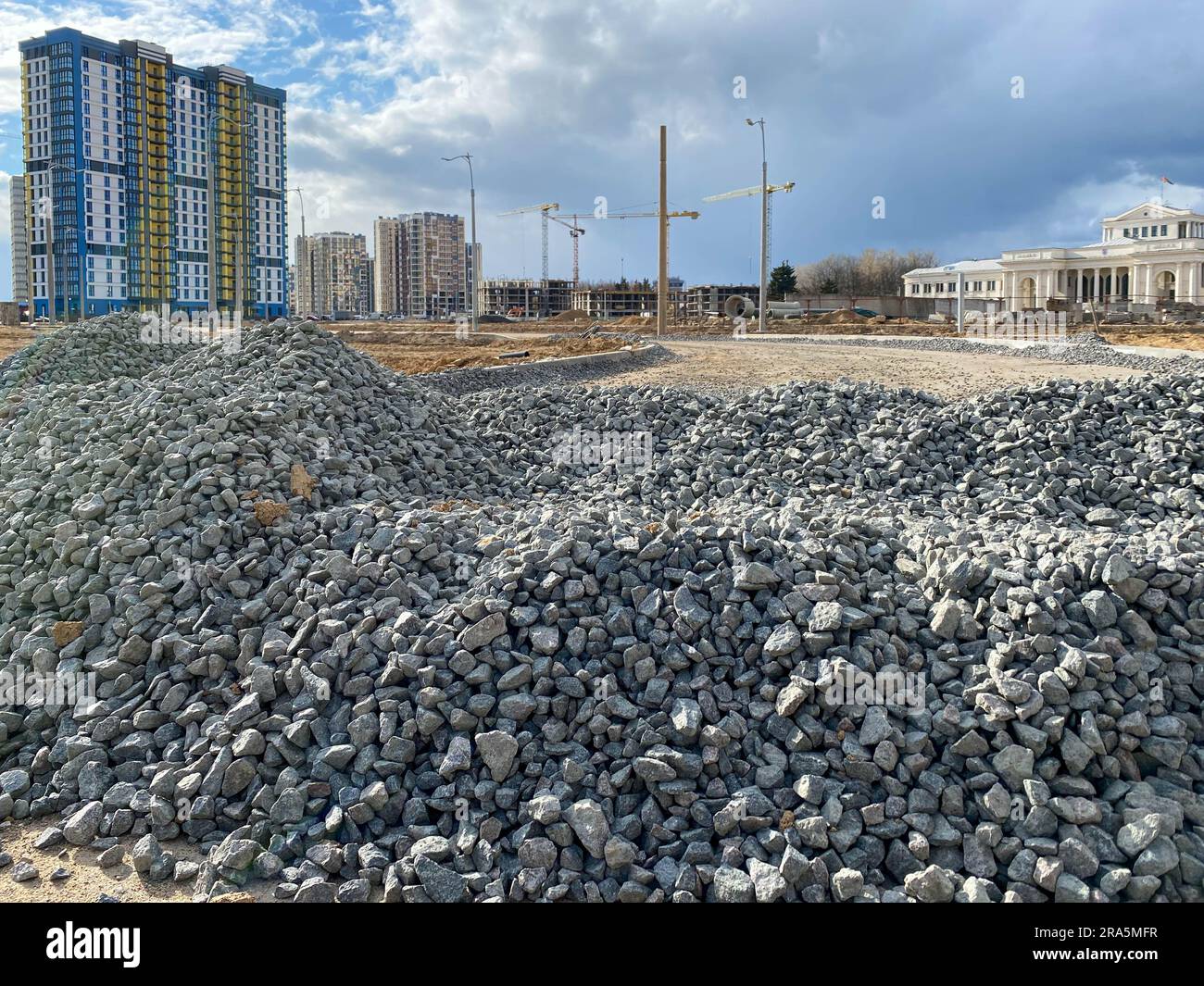 Large gray stones, rubble from industrial road construction and a view ...