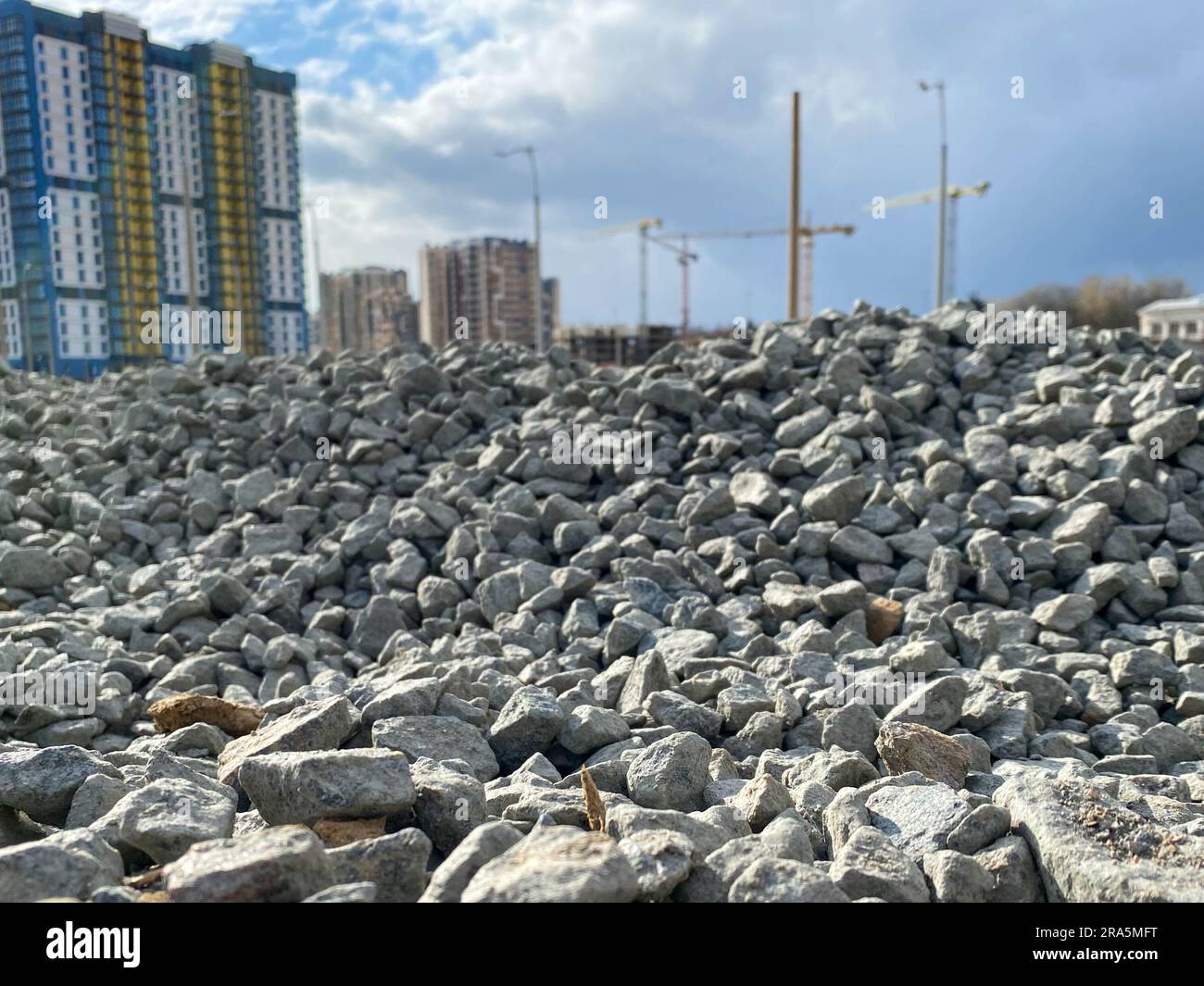 Large gray stones, rubble from industrial road construction and a view ...