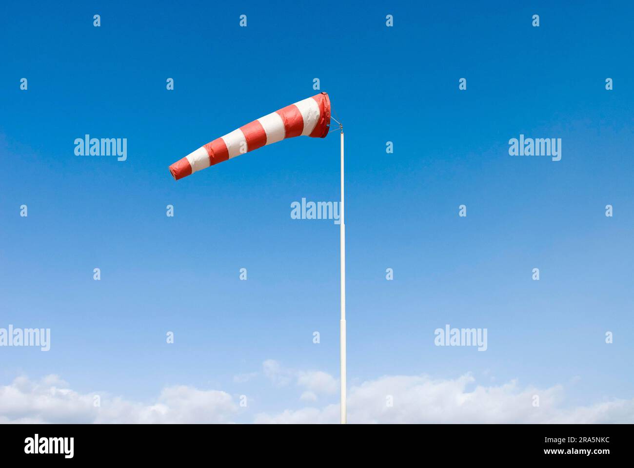 Wind sock, strong wind, airport Stock Photo - Alamy