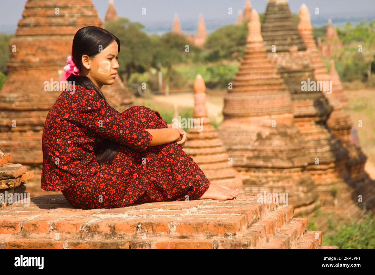 Young Burmese woman with Thanaka paste on her face, Bagan, Burma, Pagan ...