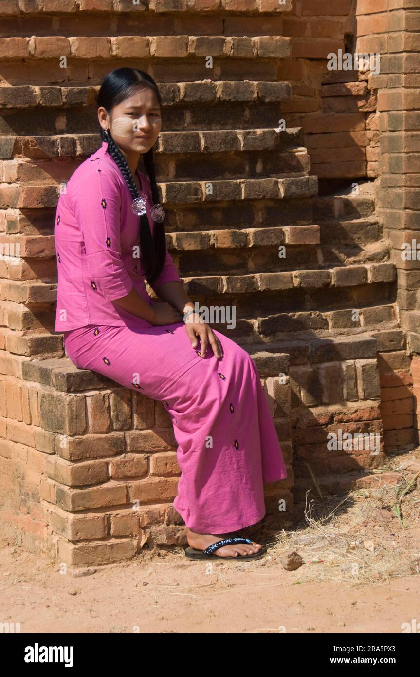 Young Burmese woman with Thanaka paste on her face, Bagan, Burma, Pagan ...