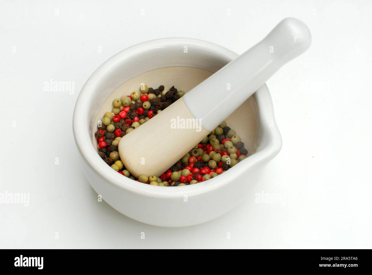 Black, white and red pepper, mortar and pestle, peppercorns, mortar ...