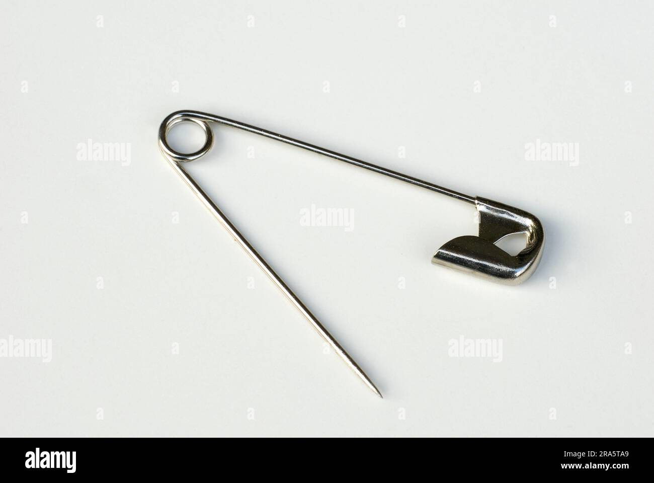 Safety pin, clipping, object Stock Photo - Alamy