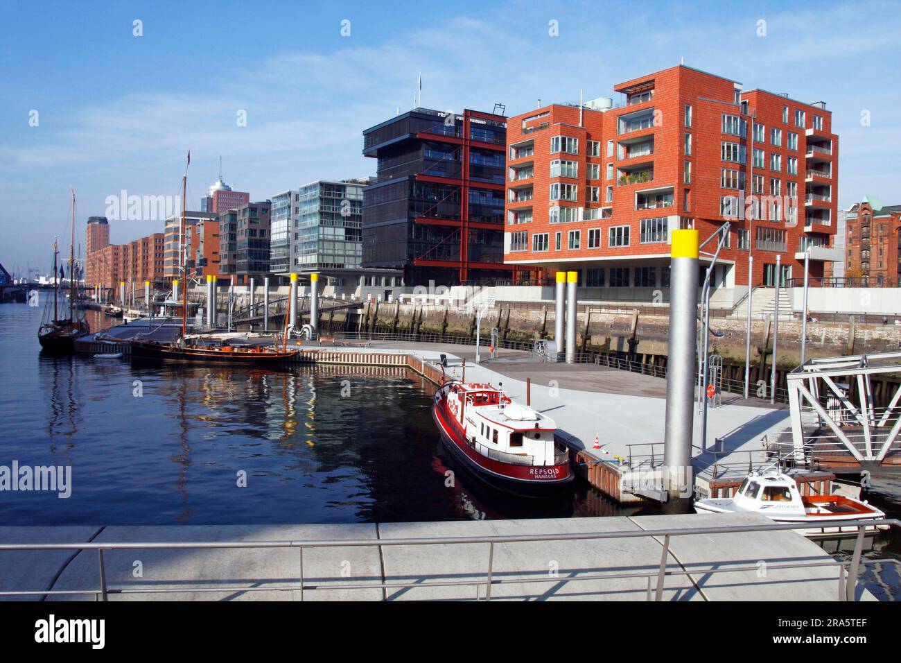Boats on the jetty, modern flats and office buildings, Magellan ...