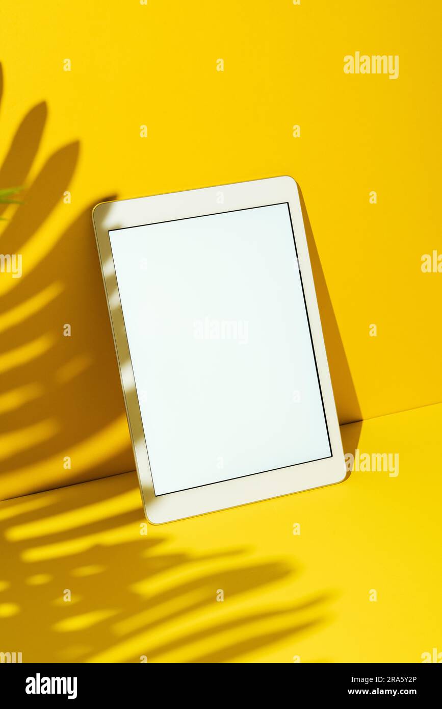 White screen digital tablet mockup, template on yellow background with ...