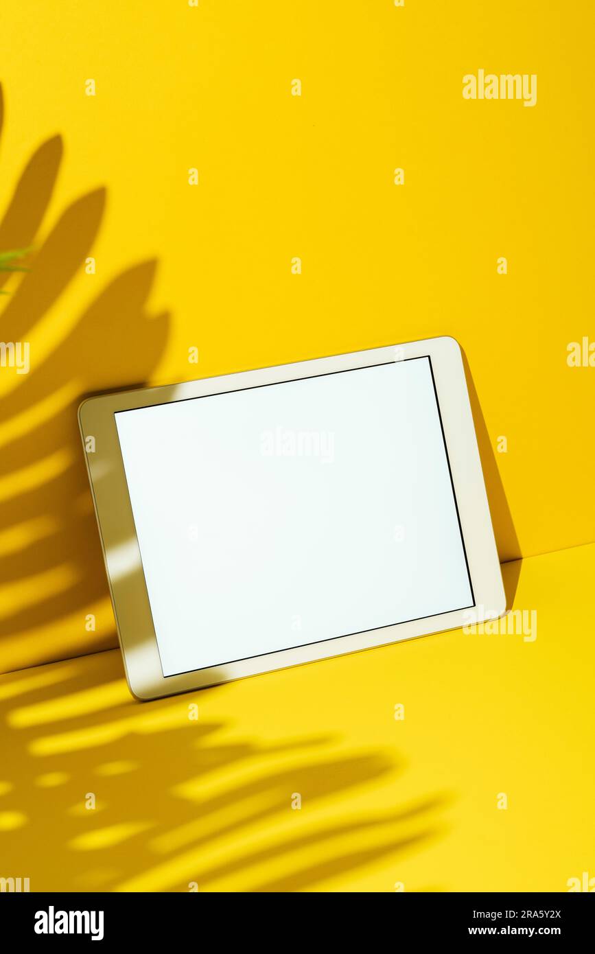 White screen digital tablet mockup, template on yellow background with ...