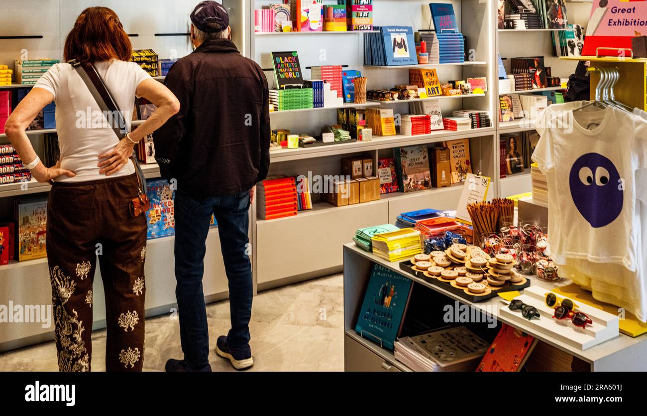 Two people in the gift shop of The National Portrait Gallery, London ...