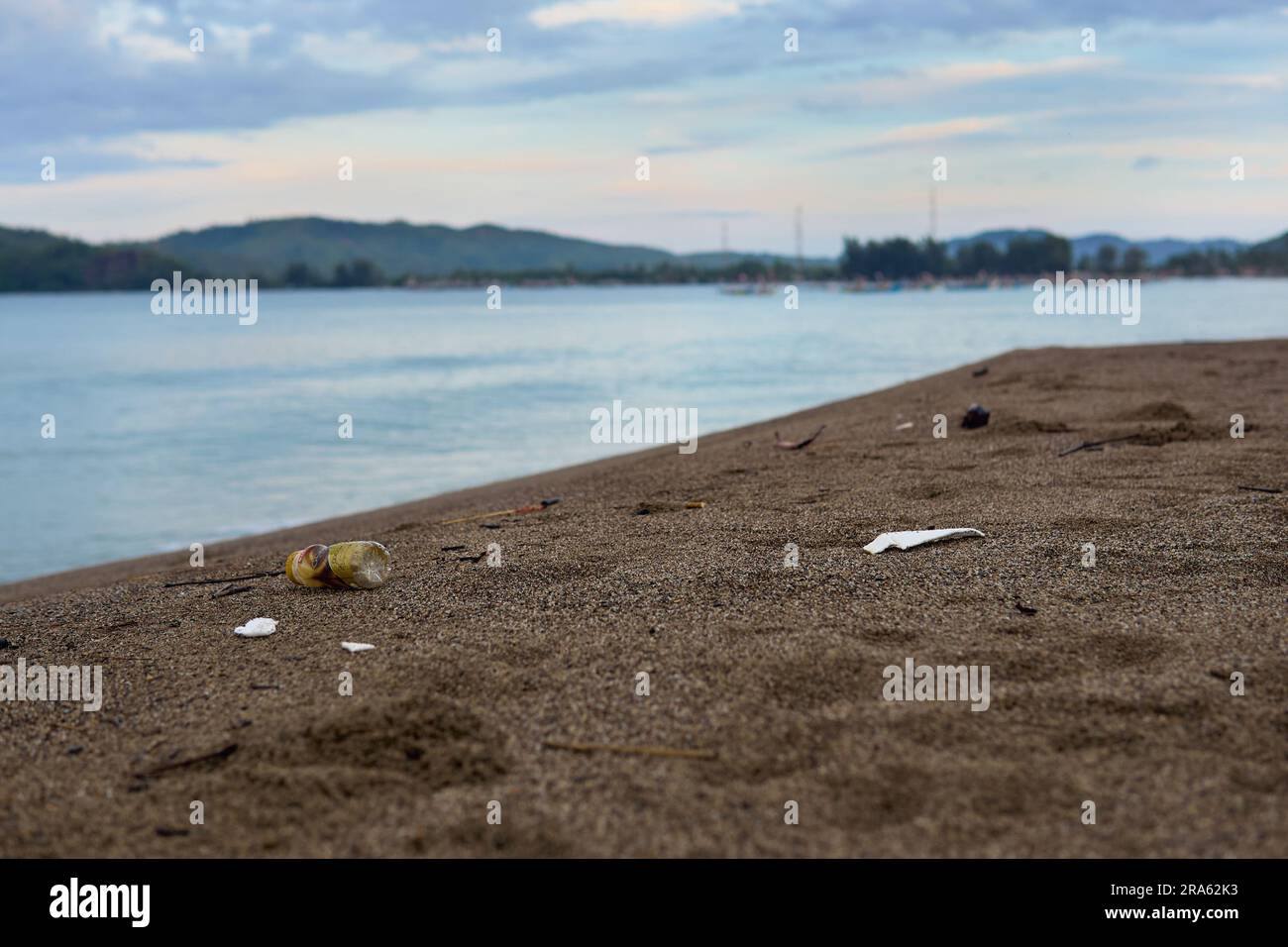 photo of trash or marine garbage on the beach Stock Photo - Alamy