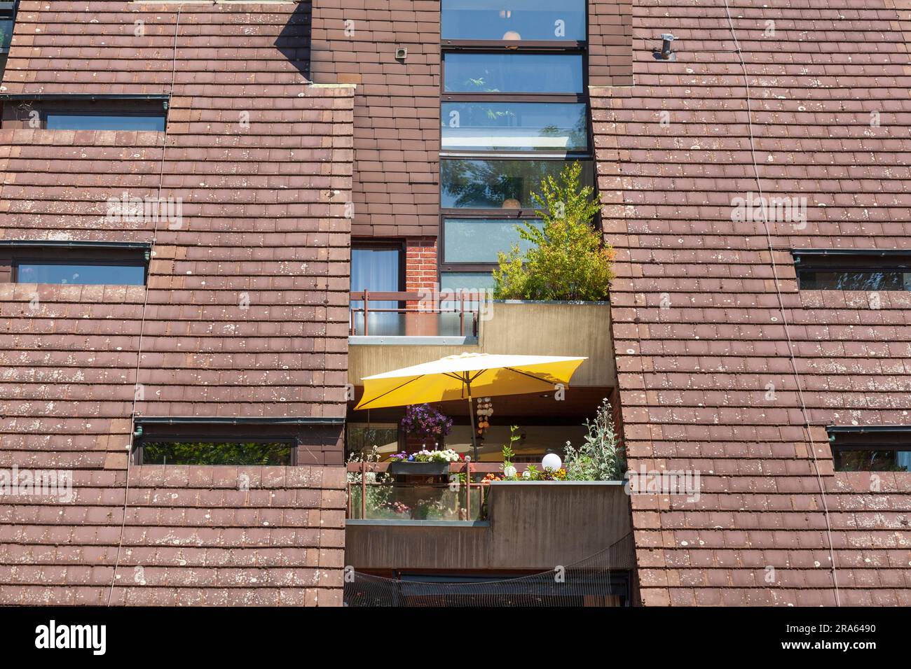 Stepped residential building, apartment building, multi-family house ...