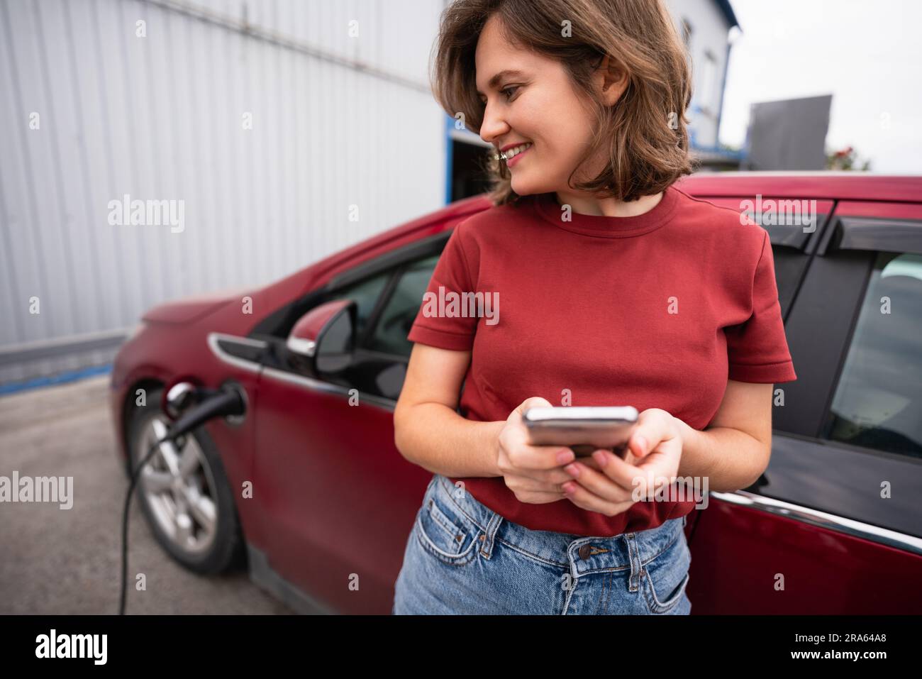 Red charging hi-res stock photography and images - Alamy