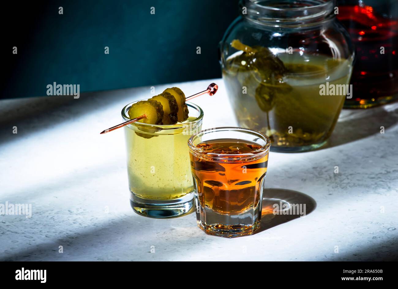 Pickleback, alcoholic cocktail drink from cucumber pickle and whiskey ...