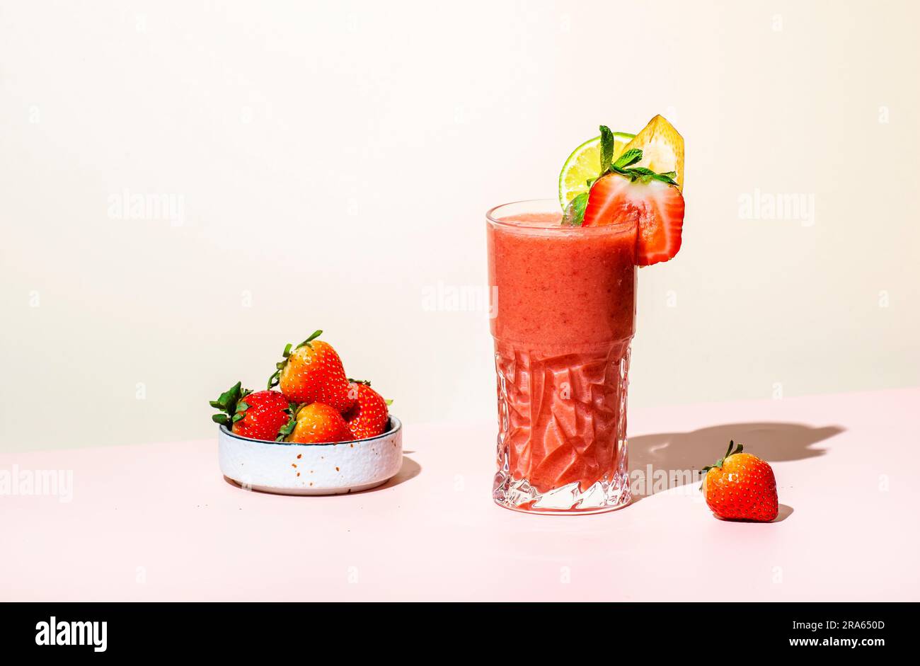 Summer non-alcoholic csmoothie drink with strawberry, banana, syrup ...
