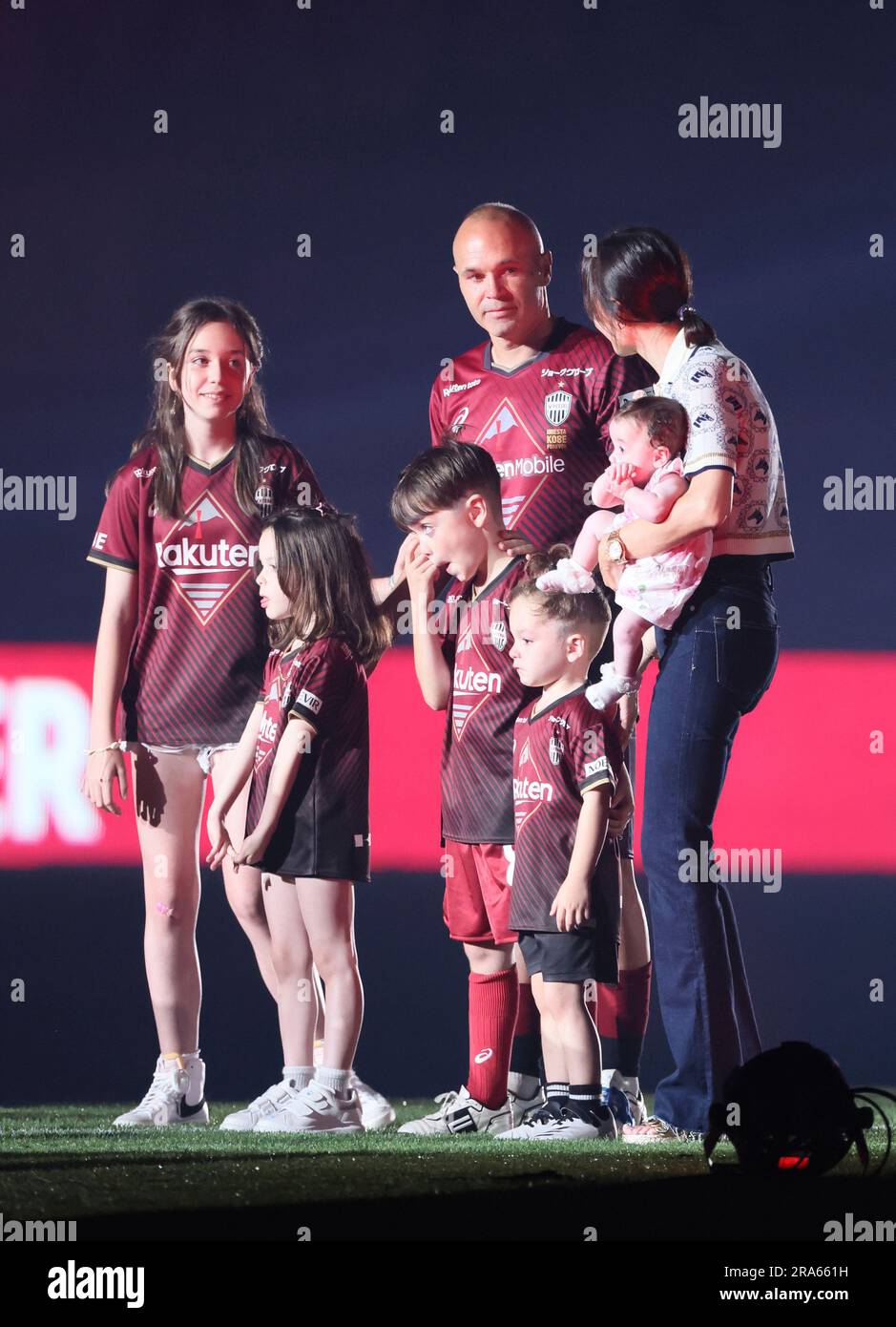 Spanish Andres Iniesta of Vissel Kobe receives flowers with his family ...