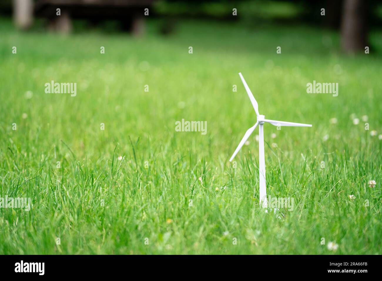 Toy wind turbine on grass Stock Photo - Alamy