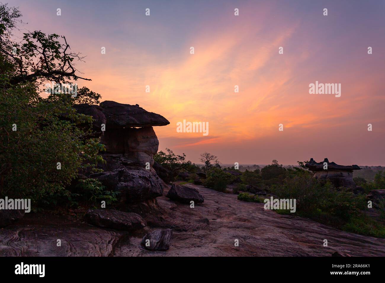 scenery sunrise at weird shaped rock. These stones have been ...
