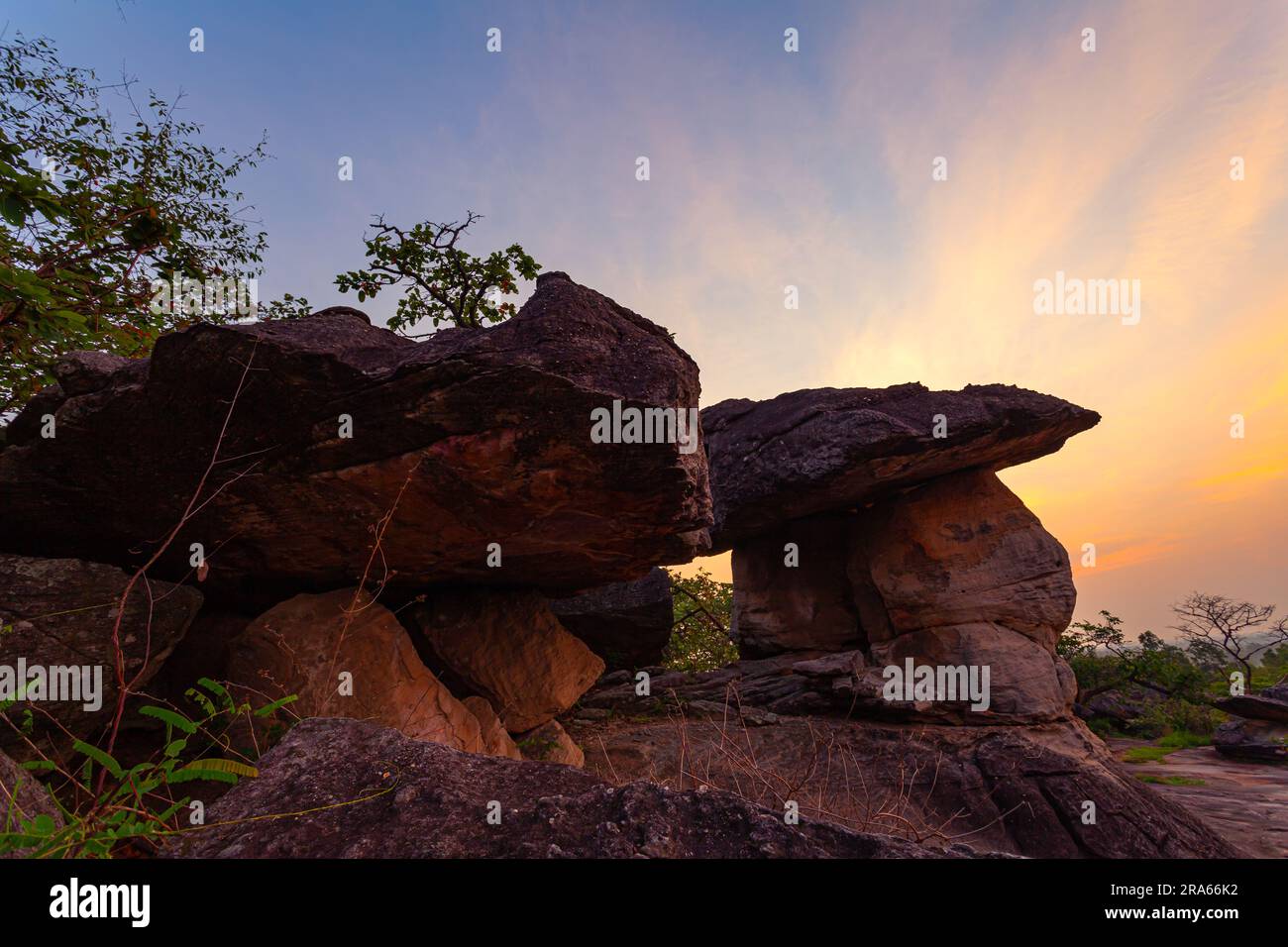 scenery sunrise at weird shaped rock. These stones have been ...