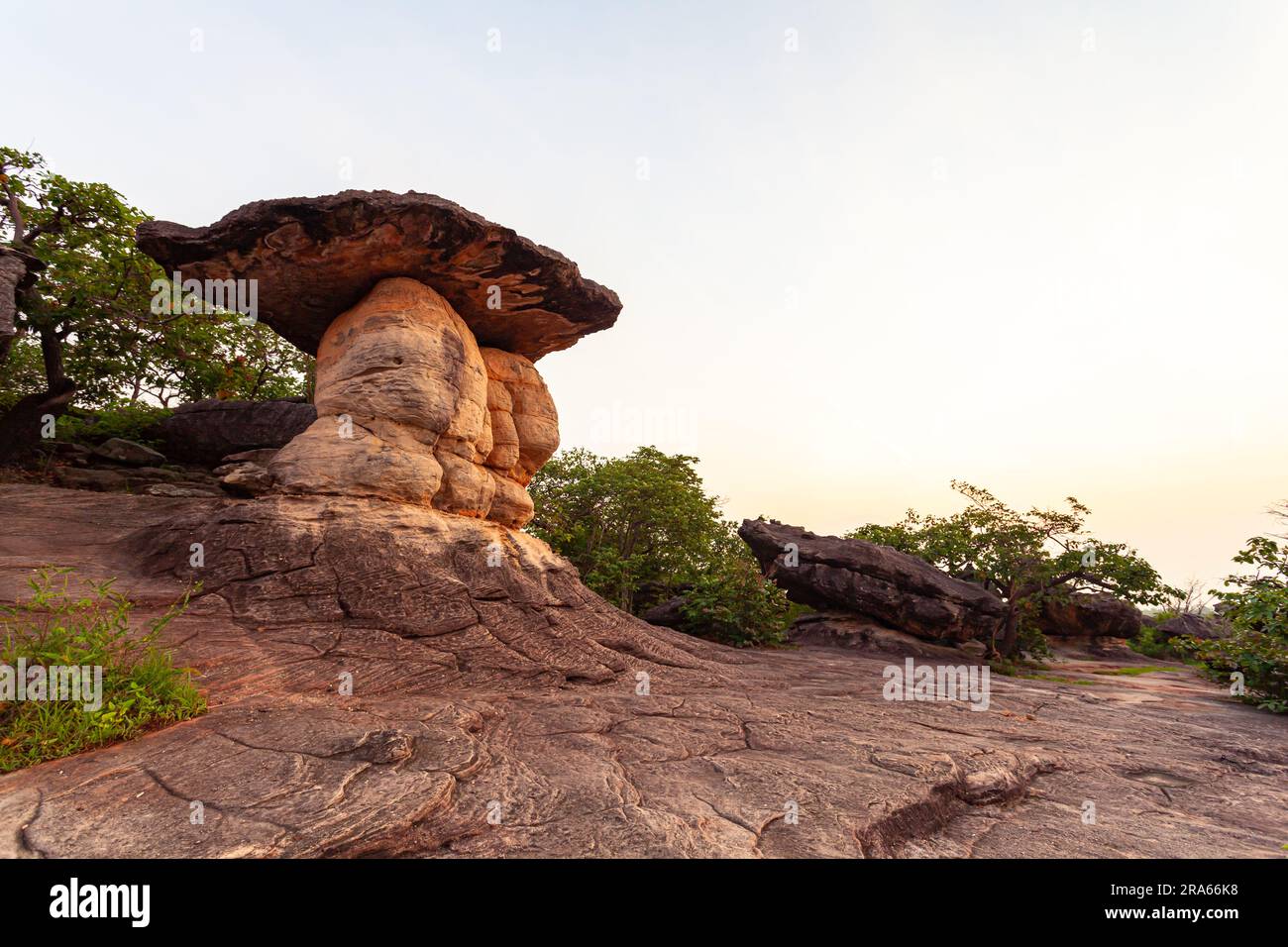 scenery sunrise at weird shaped rock. These stones have been ...