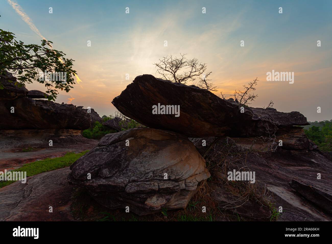 scenery sunrise at weird shaped rock. These stones have been ...