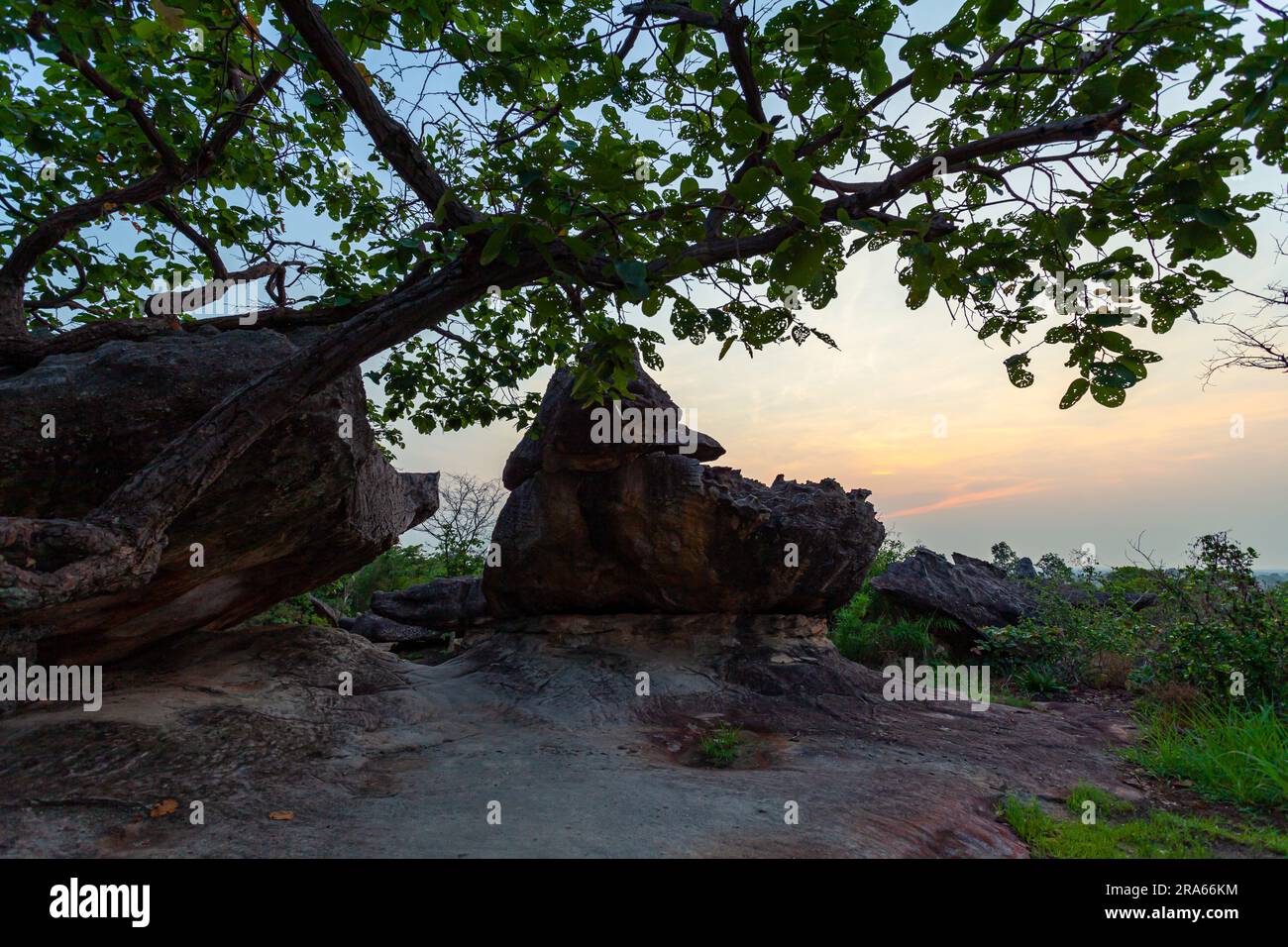scenery sunrise at weird shaped rock. These stones have been ...