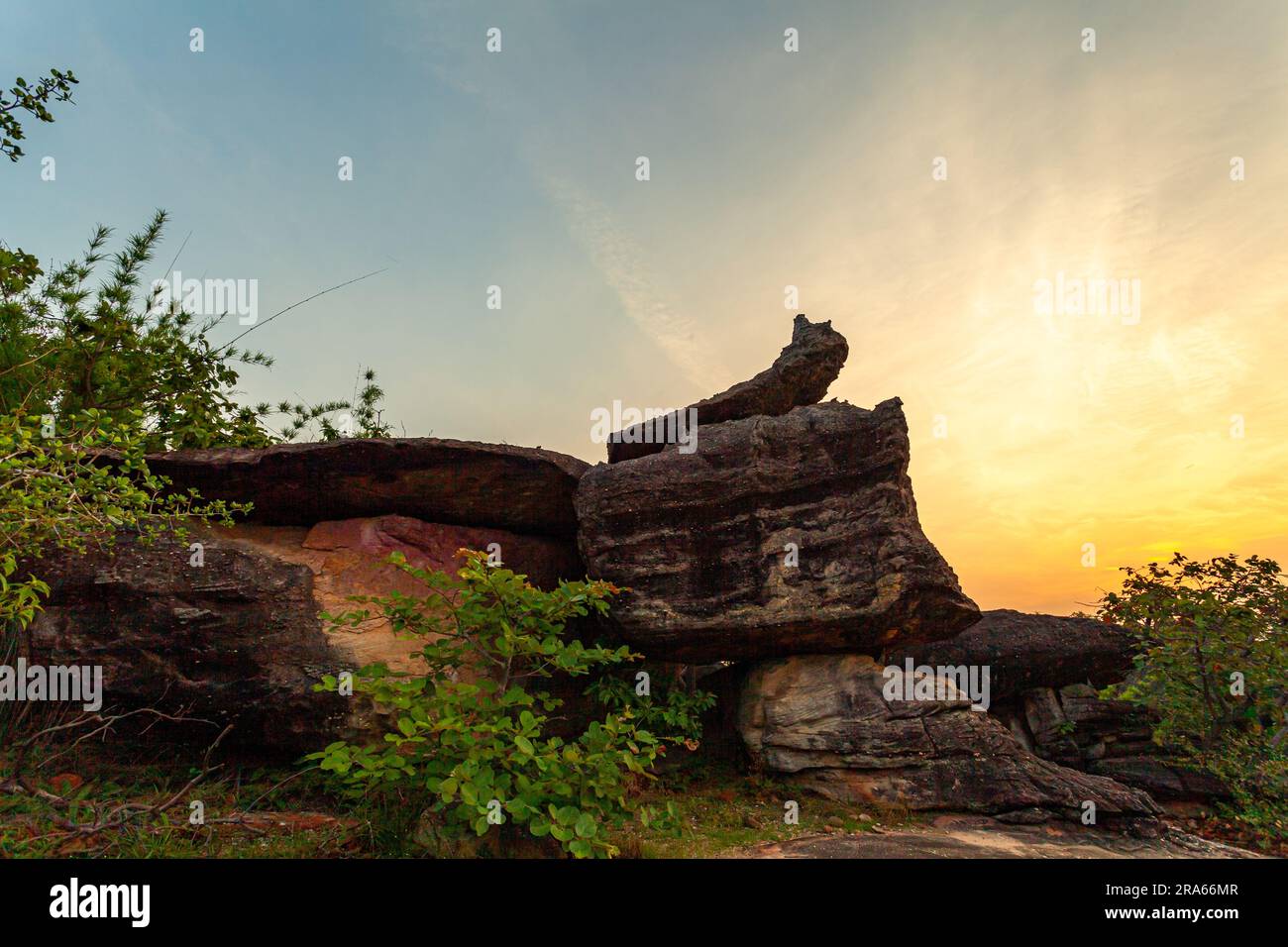 scenery sunrise at weird shaped rock. These stones have been ...