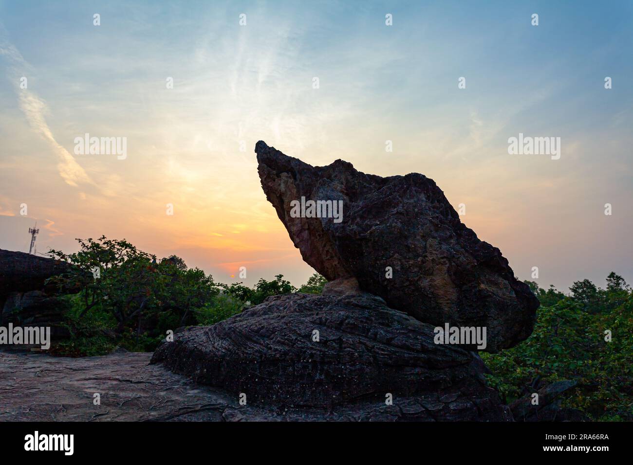 scenery sunrise at weird shaped rock. These stones have been ...