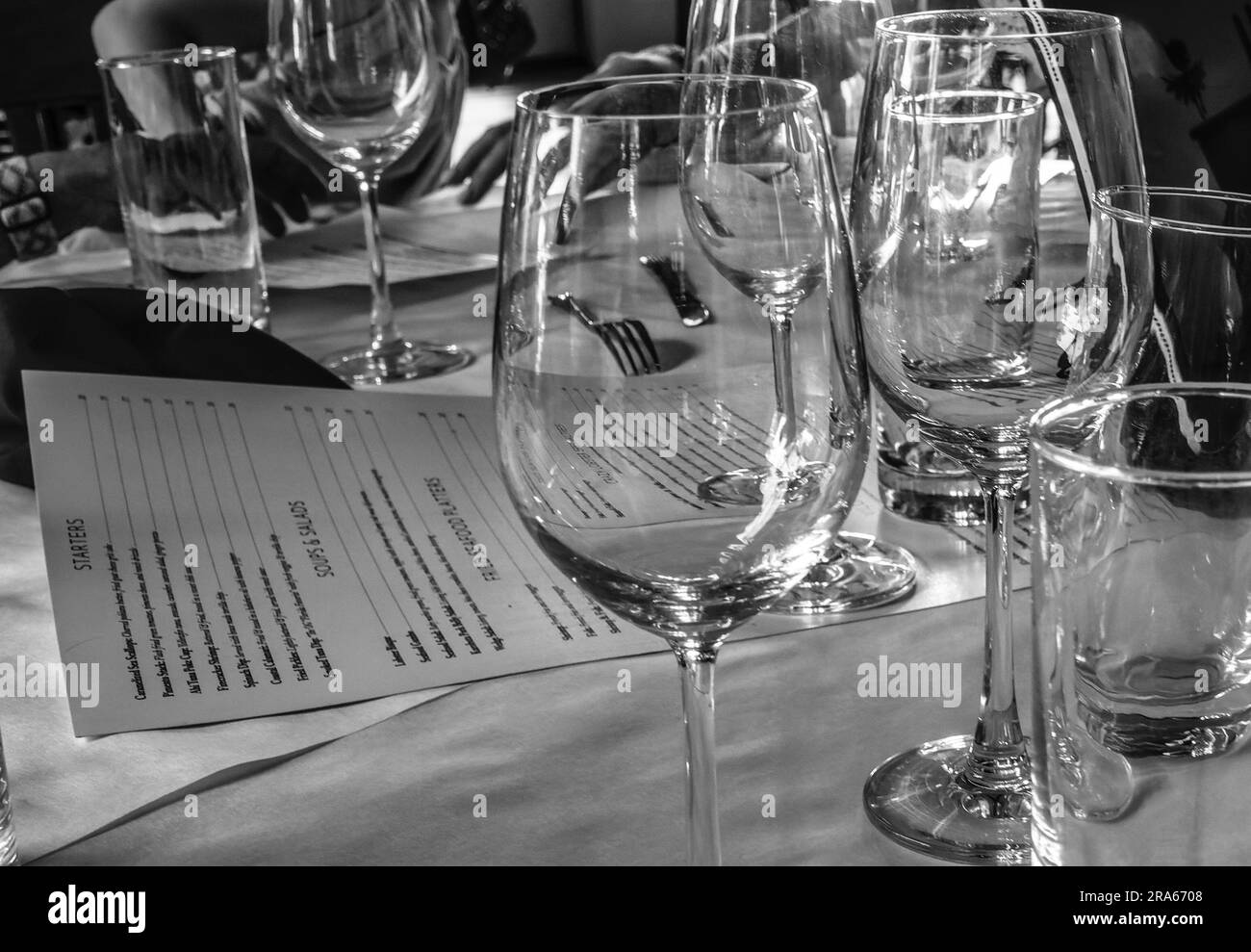 Empty table glasses in Black and White Stock Photos & Images - Alamy