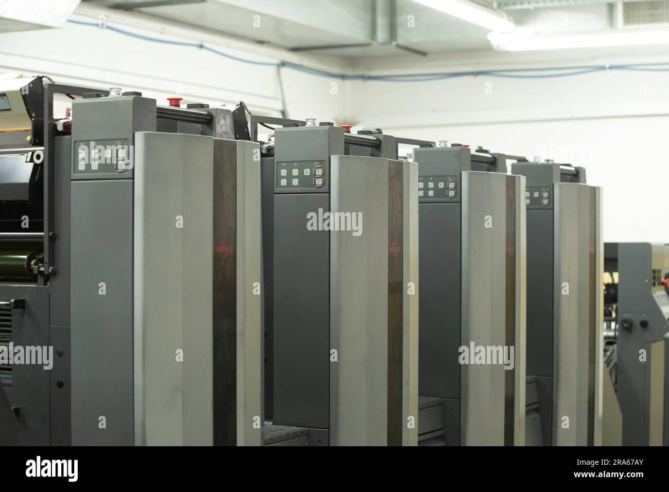 Printing house printing process interior machines paper Stock Photo - Alamy