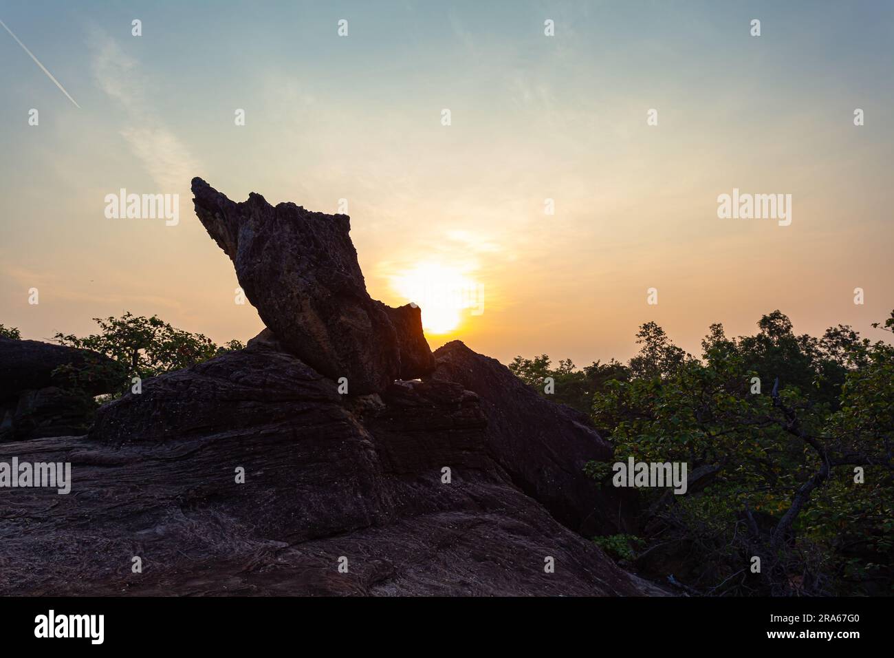 scenery sunrise at weird shaped rock. These stones have been ...
