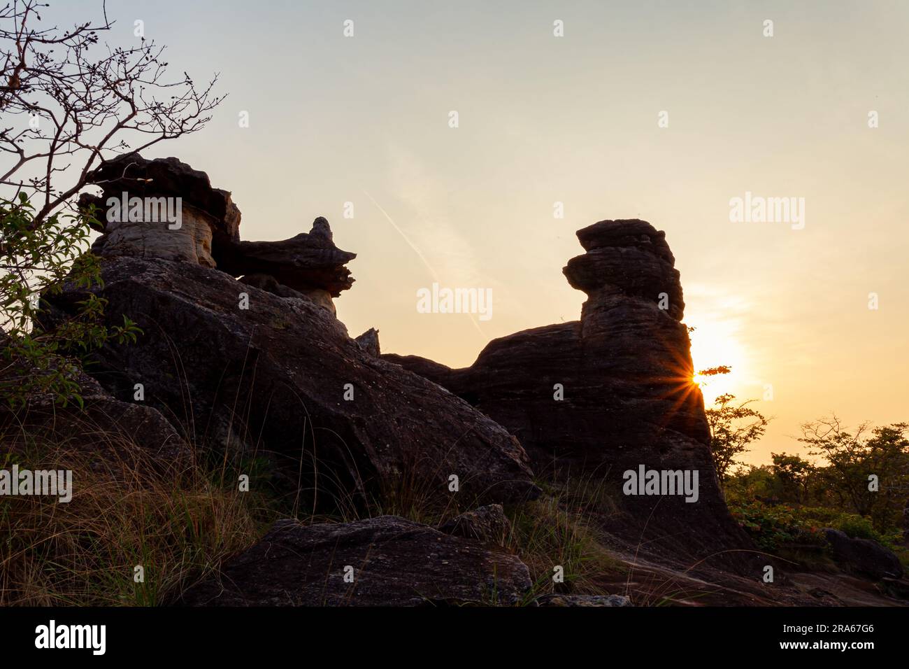 scenery sunrise at weird shaped rock. These stones have been ...