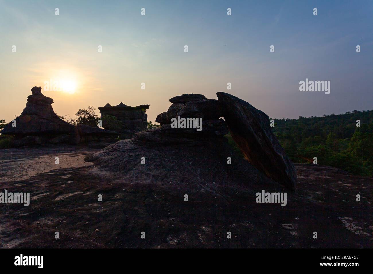 scenery sunrise at weird shaped rock. These stones have been ...
