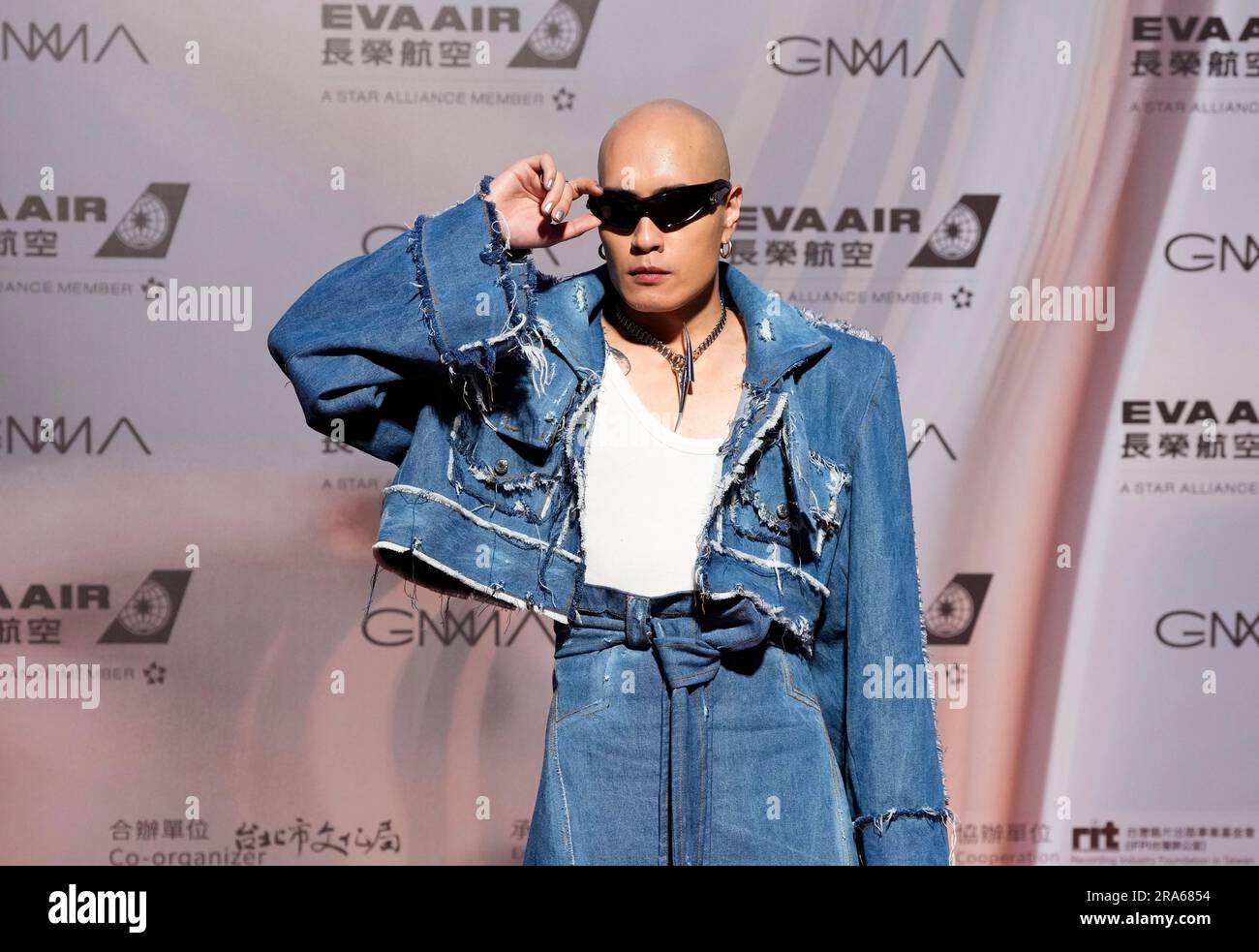 Taiwanese singer Yellow poses for a photo as he arrives for the 34th ...