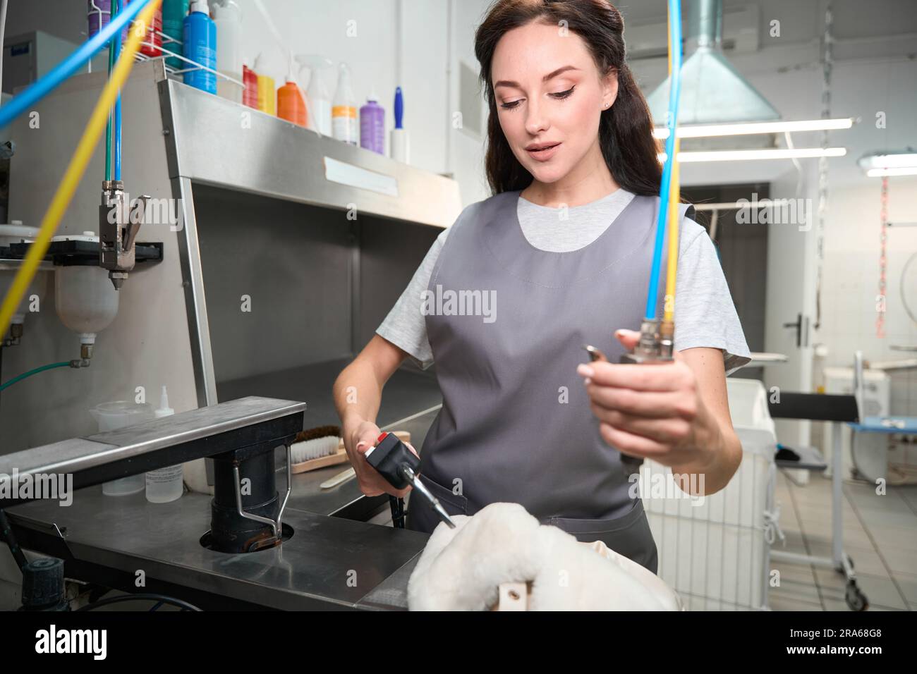 Female operator using industrial machine hi-res stock photography and ...