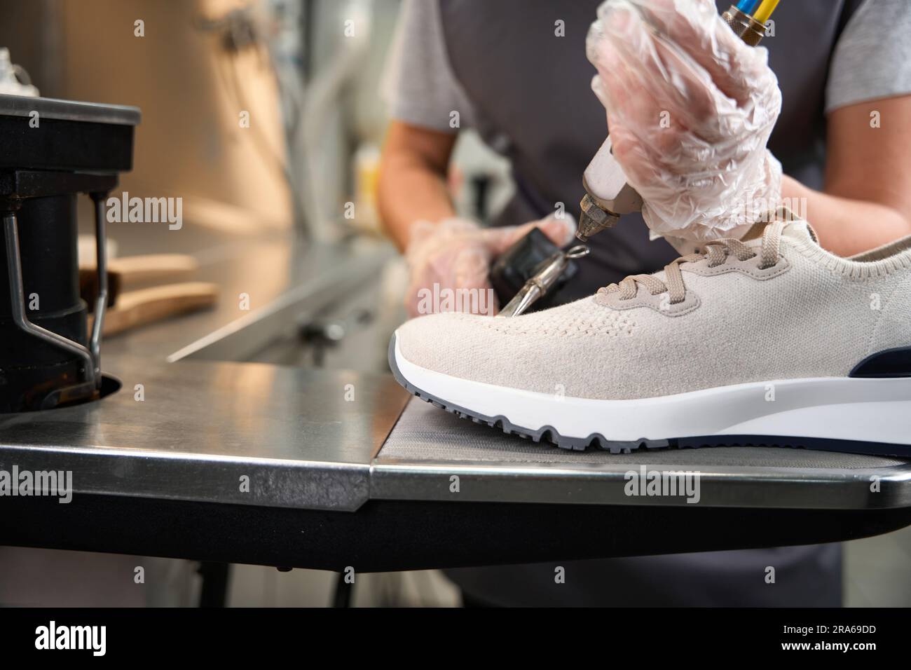 Close-up professional shoes cleaning with solvent and guns Stock Photo ...
