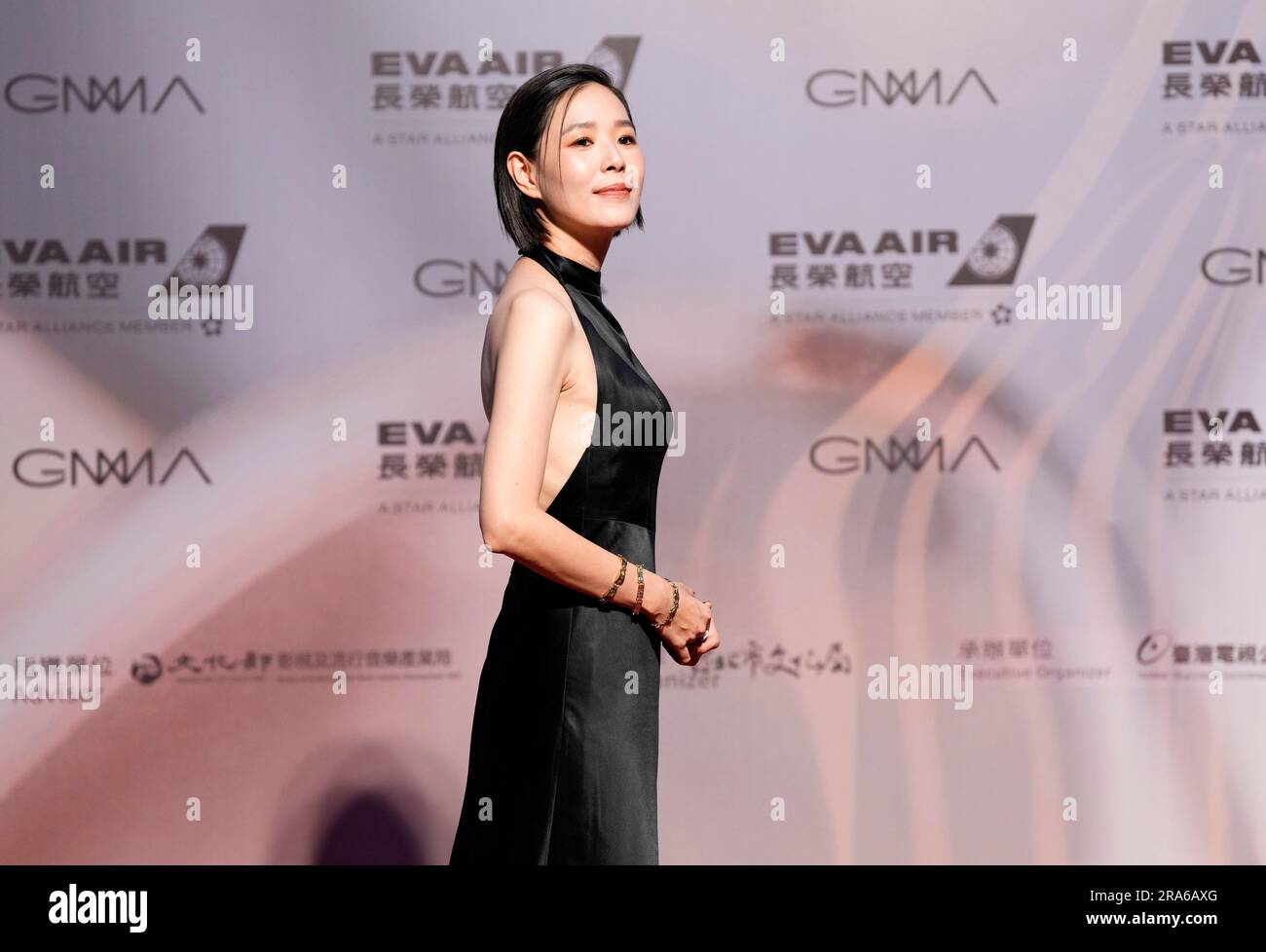 Taiwanese singer Anpu poses for a photo as she arrives for the 34th ...