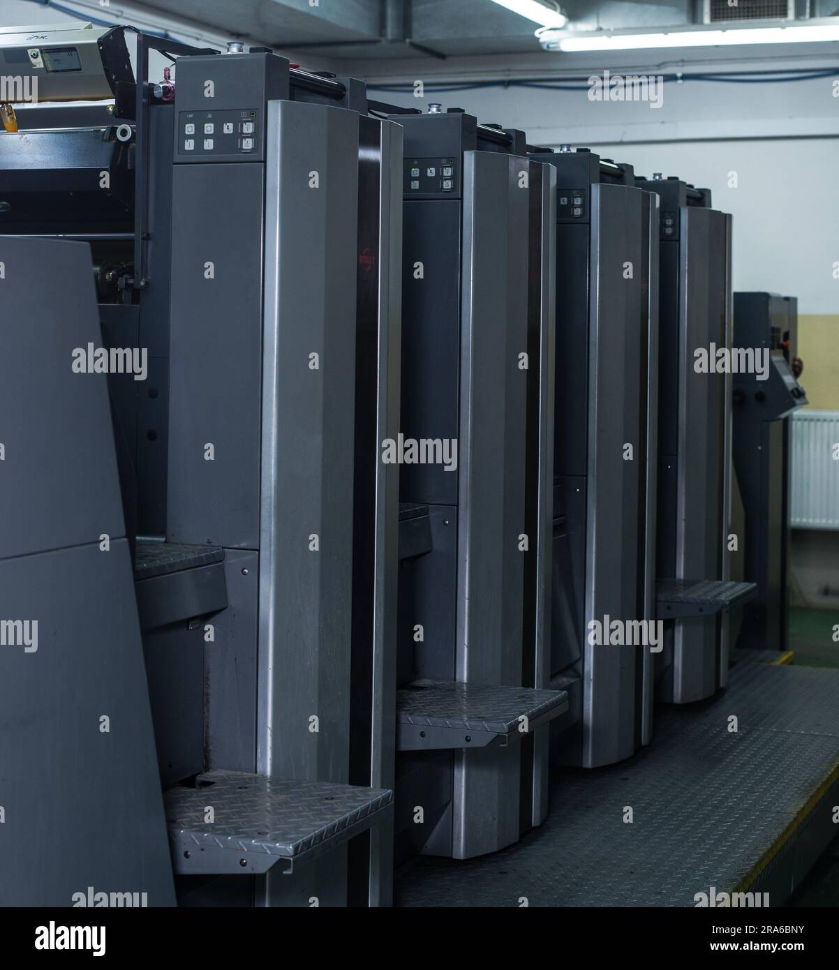Printing house printing process interior machines paper Stock Photo - Alamy