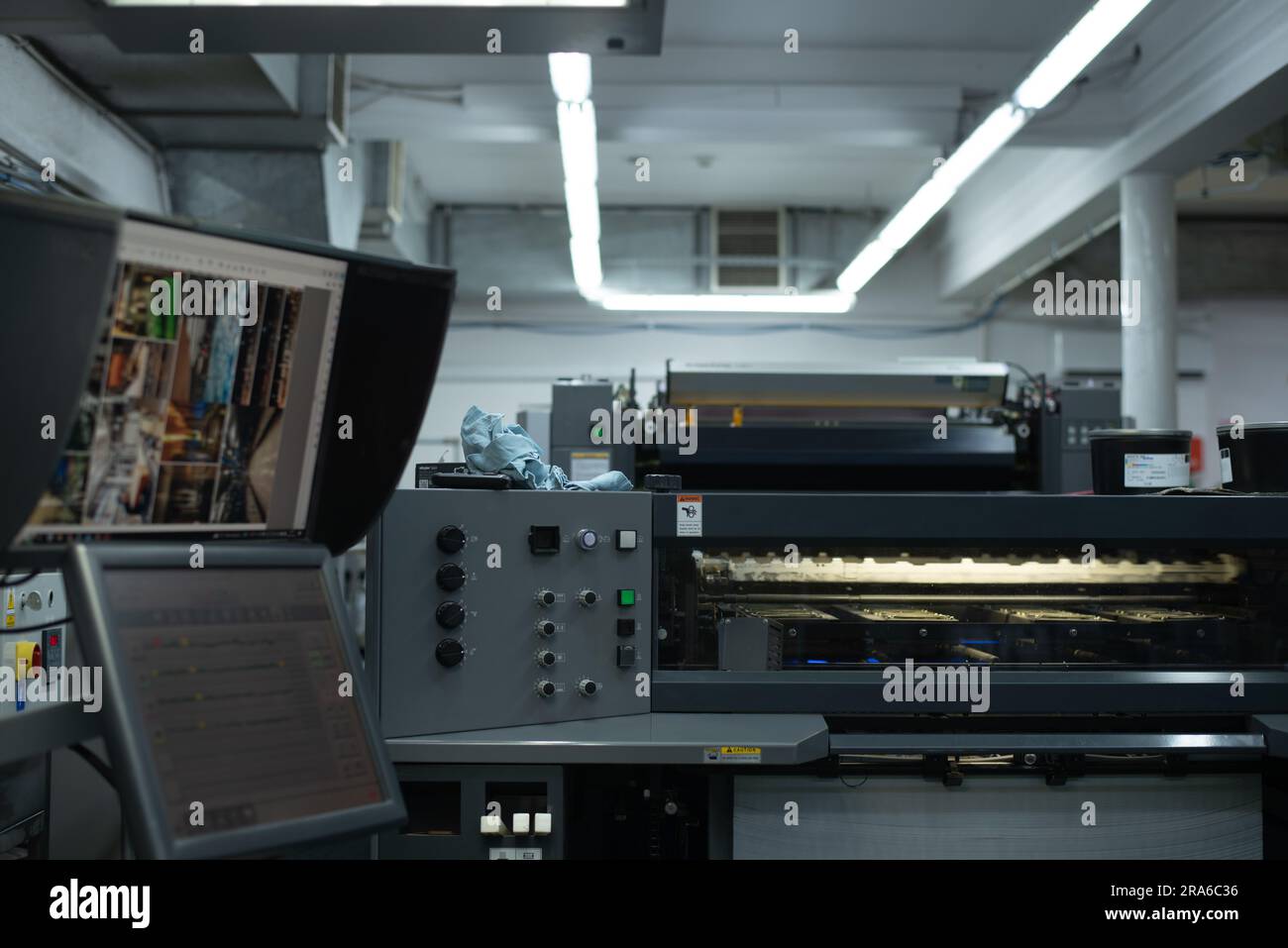 Printing house printing process interior machines paper Stock Photo - Alamy