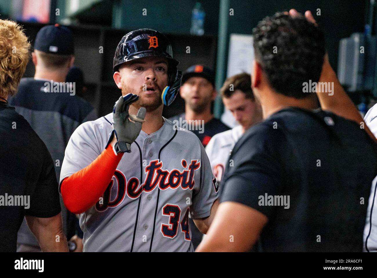 Detroit Tigers catcher Jake Rogers (34) high fives teammates after ...