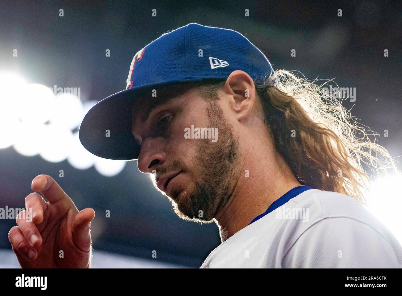 Texas Rangers left fielder Travis Jankowski (16) walks back into the ...