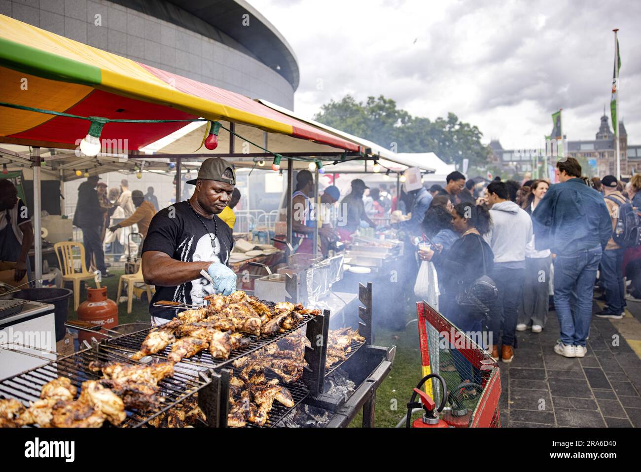AMSTERDAM - Visitors of the Keti Koti Festival on the Museumplein. The ...