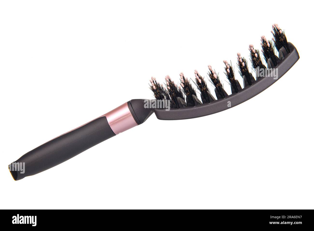 A bristled pink hair brush against a white background Stock Photo - Alamy