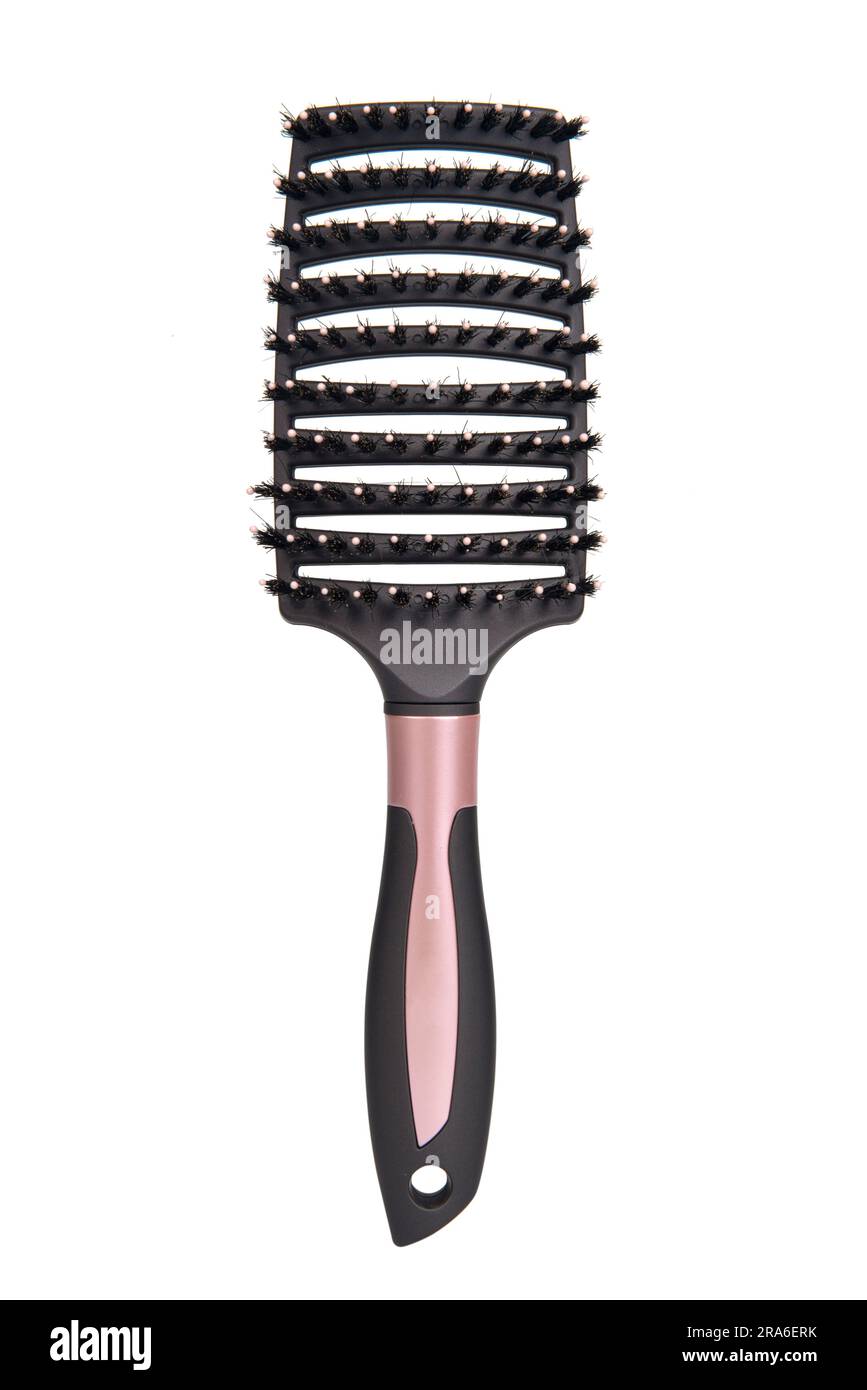 A bristled pink hair brush against a white background Stock Photo - Alamy