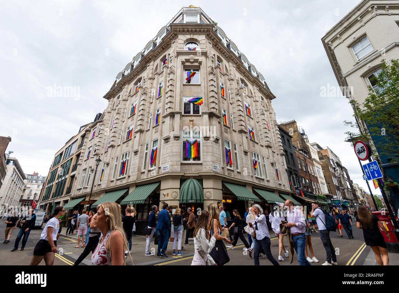 London, UK. 1 July 2023. Rainbow flags decorate the Warwick pub in Soho ...